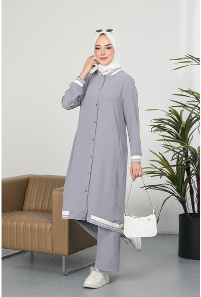 İlkimay Şerit Detaylı Düğmeli Ayrobin Asel Tesettür Tunik Pantolon Ikili Takım 314 - Gri İlkimay Şerit Detaylı Düğmeli Ayrobin Asel Tesettür Tunik Pantolon Ikili Takım 314 - Gri