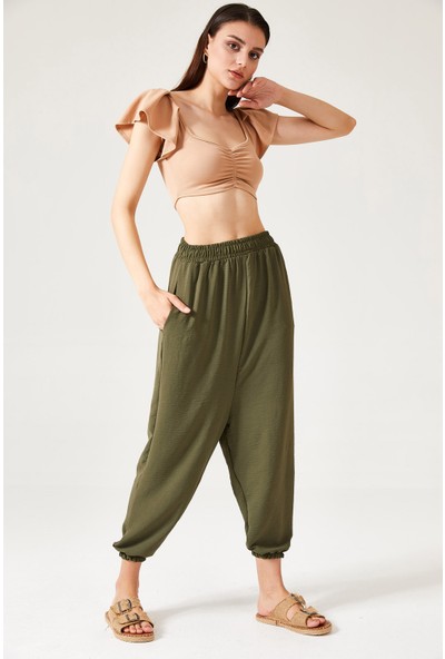 Oshebu Kadın Beli ve Paçası Lastikli Şalvar Pantolon Oshebu Kadın Beli ve Paçası Lastikli Şalvar Pantolon