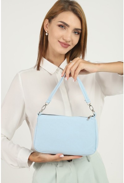 Shaka U16 Mavi Baget El ve Omuz Çantası U:15 cm E:25 cm G:7cm Shaka U16 Mavi Baget El ve Omuz Çantası U:15 cm E:25 cm G:7cm