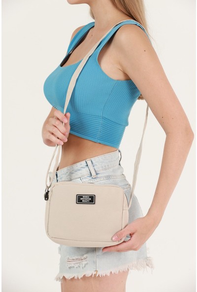 Shaka U35 Krem Tek Bölmeli Kol ve Omuz Çantası U:14 E:20 G:5 cm Shaka U35 Krem Tek Bölmeli Kol ve Omuz Çantası U:14 E:20 G:5 cm