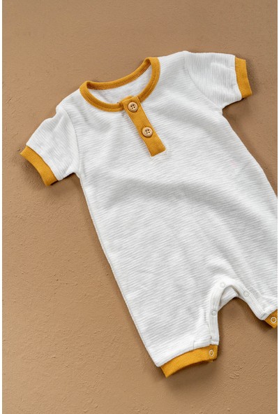 Wicoi Baby Unisex Ekru Kısa Kollu Şortlu Örme Tulum Wicoi Baby Unisex Ekru Kısa Kollu Şortlu Örme Tulum