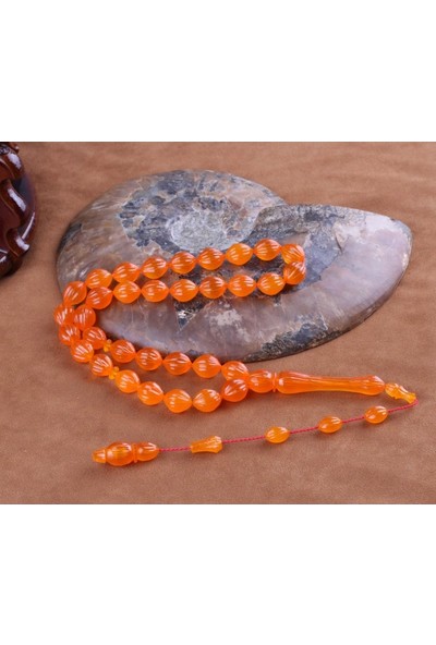 Burhan Sağlam Ateş Kehribarı Arpa Kesim Kalem Işçilikli Sistem Püsküllü Tesbih Burhan Sağlam Ateş Kehribarı Arpa Kesim Kalem Işçilikli Sistem Püsküllü Tesbih