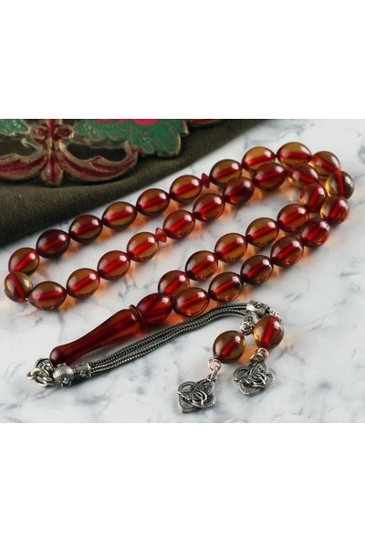 Burhan Sağlam Ateş Kehribarı Arpa Kesim Gümüş Püsküllü 2 Yedek Habbeli Tesbih Burhan Sağlam Ateş Kehribarı Arpa Kesim Gümüş Püsküllü 2 Yedek Habbeli Tesbih