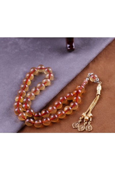 Burhan Sağlam Ateş Kehribarı Küre Kesim Gümüş Püsküllü Tesbih Burhan Sağlam Ateş Kehribarı Küre Kesim Gümüş Püsküllü Tesbih