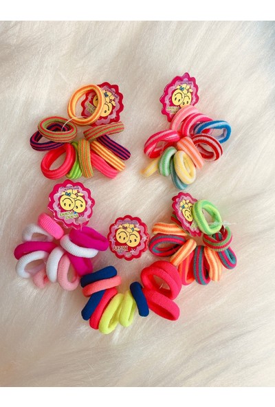 Yeşim Aksesuar Renkli Küçük Lastikli Bebek Çocuk Tokası 50 Adet Yeşim Aksesuar Renkli Küçük Lastikli Bebek Çocuk Tokası 50 Adet