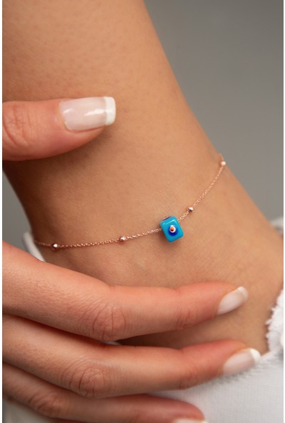 Elika Silver Kadın Rose Kaplama Top Zincir Detaylı Mineli Minik Nazar Boncuklu 925 Ayar Gümüş Halhal Elika Silver Kadın Rose Kaplama Top Zincir Detaylı Mineli Minik Nazar Boncuklu 925 Ayar Gümüş Halhal